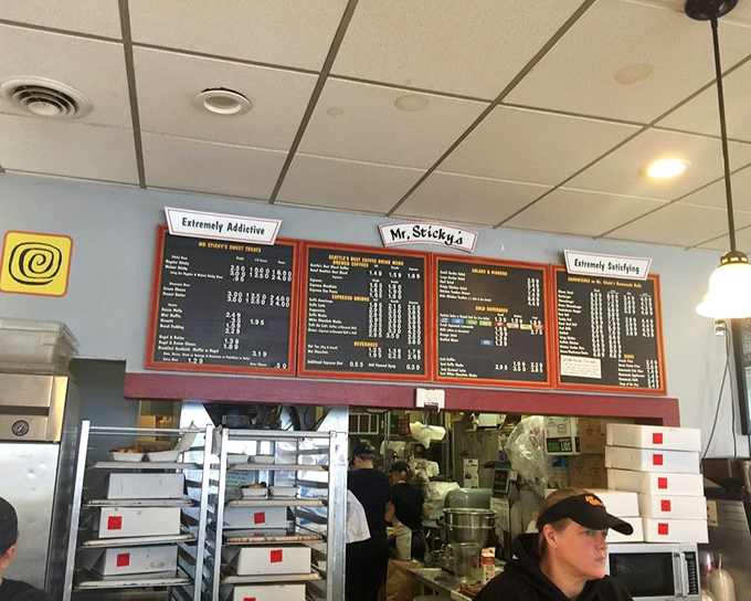Behind these menu boards lies a sticky bun laboratory where magic happens daily. The "Extremely Addictive" warning isn't hyperbole—it's a public service announcement.