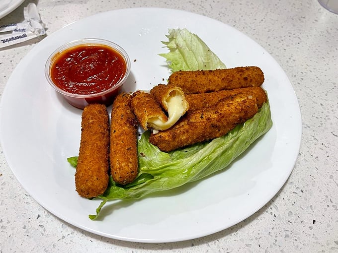 Mozzarella sticks – where cheese gets dressed up in its crunchy best outfit before taking a dip in marinara.