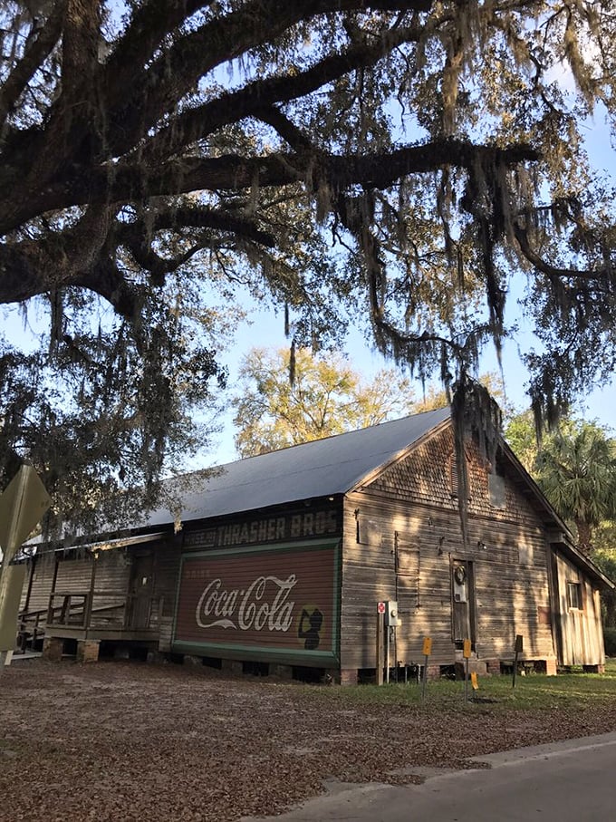 The old Thrasher Bros. warehouse with its faded Coca-Cola sign reminds us that advertising was an art form long before digital billboards.
