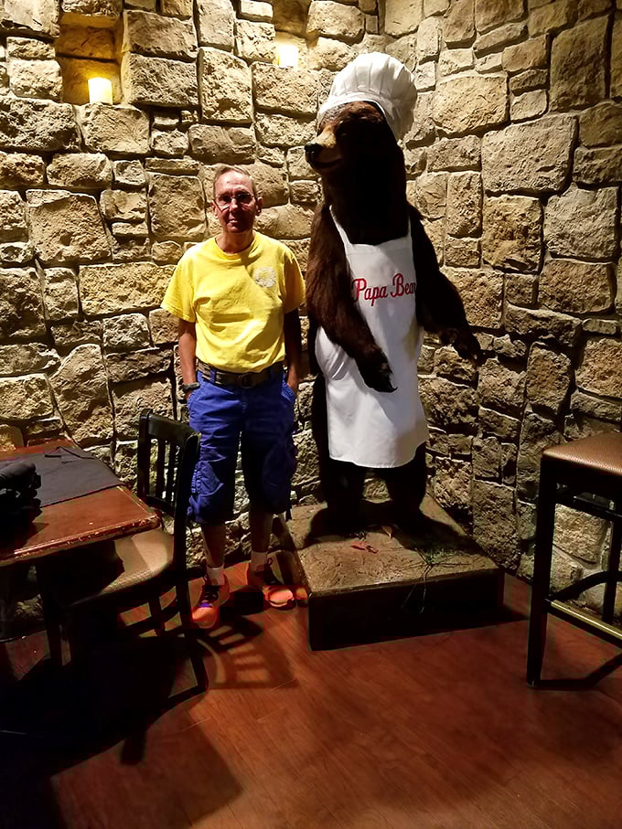 The restaurant's mascot stands guard in chef's attire—a whimsical touch that reminds you this place doesn't take itself too seriously, just its food.
