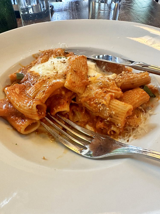 Even in breakfast country, lunch deserves respect. These rigatoni tubes swimming in rich tomato sauce would make any Italian nonna nod approvingly.