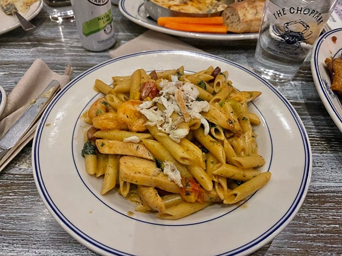 Pasta that doesn't just carry the seafood—it celebrates it. Those chunks of crab meat aren't hiding; they're taking a well-deserved bow.
