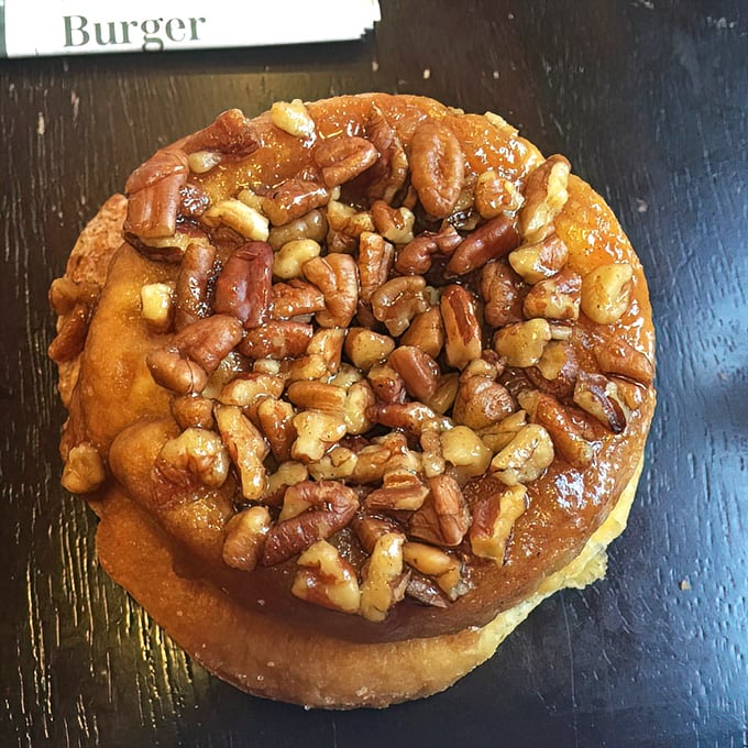 This pecan-topped masterpiece isn't just a donut – it's what happens when breakfast and dessert have a beautiful love child.