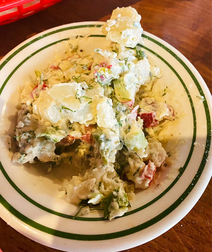 A potato salad that doesn't apologize for being exactly what it is—creamy, chunky, and ready to support your seafood adventure.