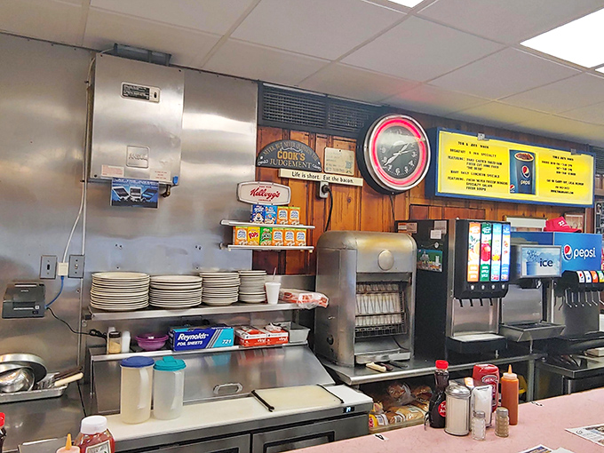 The beating heart of any great diner—a prep station where breakfast magic happens at lightning speed, with cereal boxes standing guard.