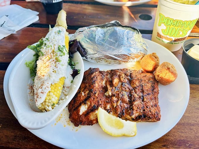 This blackened fish with corn on the cob isn't just dinner—it's edible evidence that simple seasoning and fresh ingredients win every time.