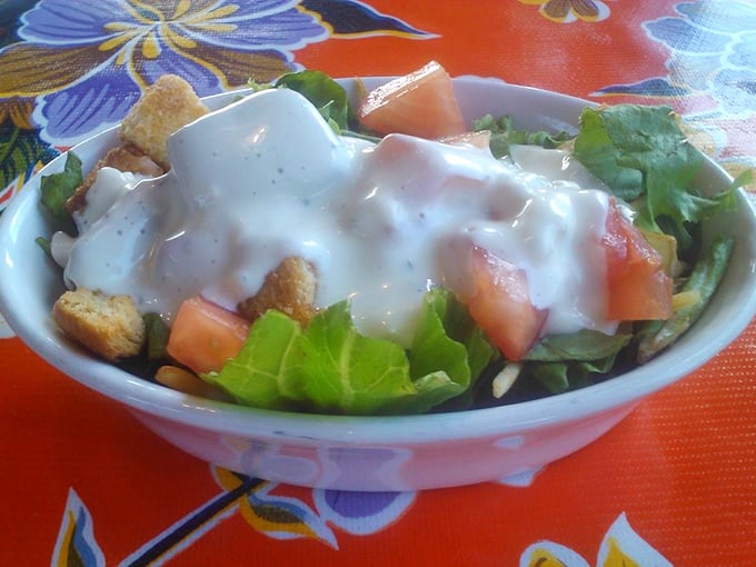 Even salads get the royal treatment here—crisp greens, fresh tomatoes, and house-made dressing that makes eating vegetables feel like cheating.