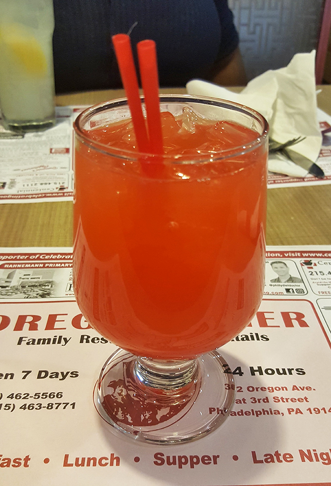 This isn't just a cocktail—it's vacation in a glass. The Singapore Sling brings tropical vibes to South Philly, no passport required.