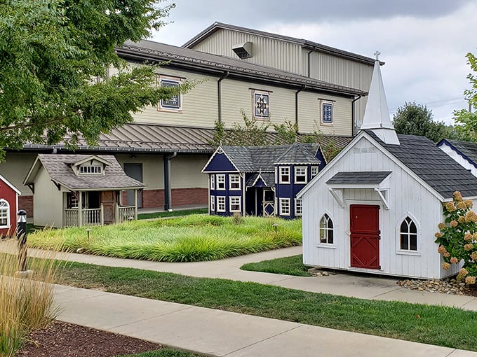Miniature houses create a storybook village scene. It's like someone shrunk the real buildings – a delightful playground for imagination or perhaps very tiny tourists.