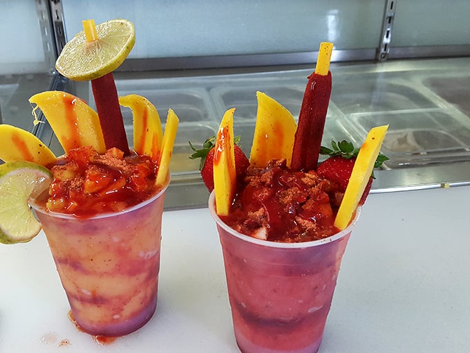 Fruit cups that look like they're dressed for their own quinceañera. These aren't just snacks—they're celebrations in a cup.