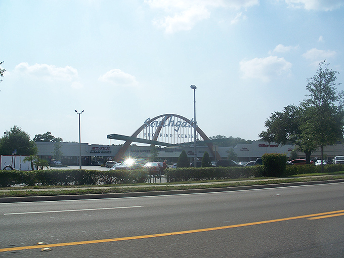 Southgate Shopping Center's distinctive arch welcomes shoppers with mid-century flair – a shopping experience with a side of architectural nostalgia.