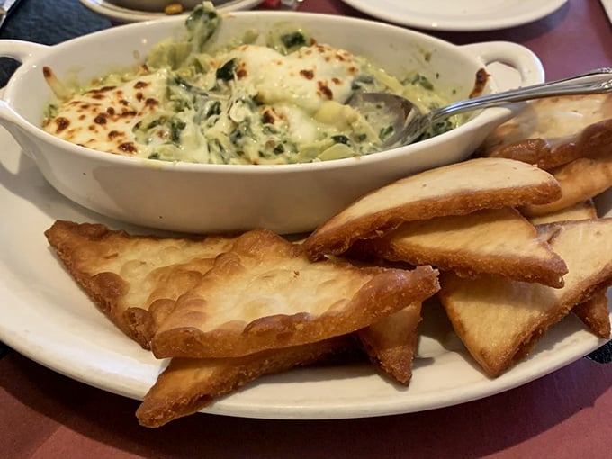 Spinach artichoke dip so creamy and indulgent, it should probably come with its own warning label for addiction.