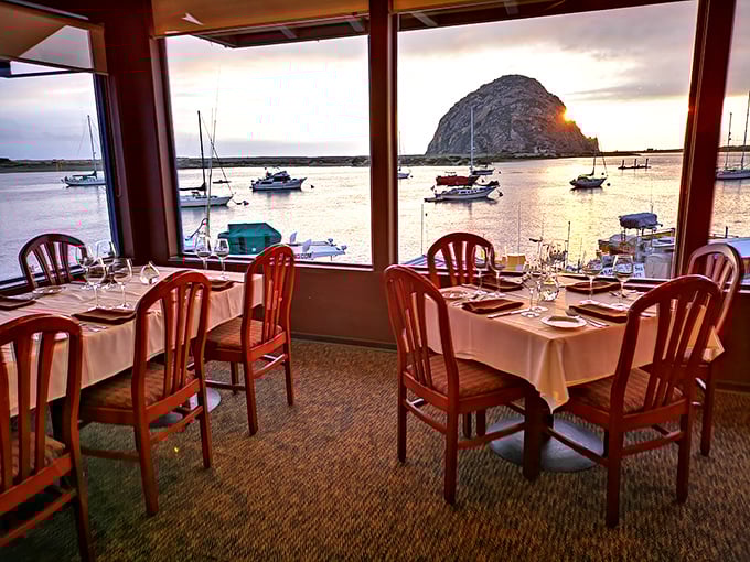 Not just a view—a front-row seat to nature's greatest show, where Morro Rock stands sentinel as boats bob gently in golden hour light.