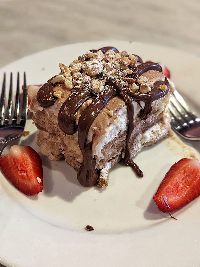 Tiramisu that transports you straight to an Italian café. The coffee-soaked layers and chocolate drizzle create the perfect sweet finale.