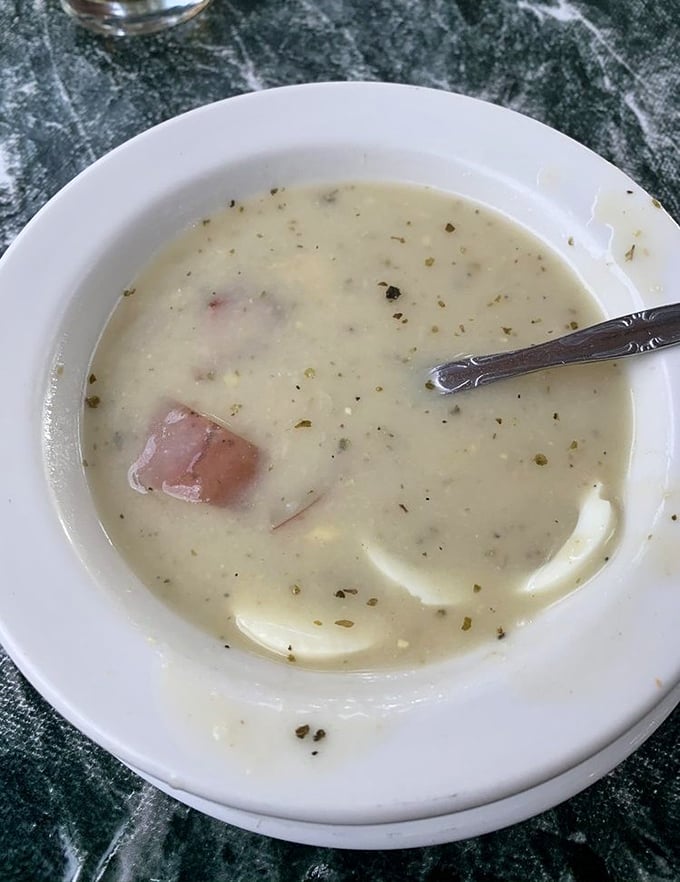 Ah, Polish white borscht—where comfort meets tradition in a creamy, smoky pool of goodness. Like a warm hug from a babcia you never knew.