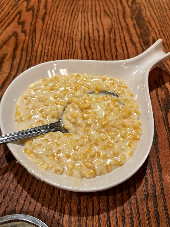 Creamed corn elevated from cafeteria staple to celebrity status—each kernel bathing luxuriously in a creamy hot tub of flavor.