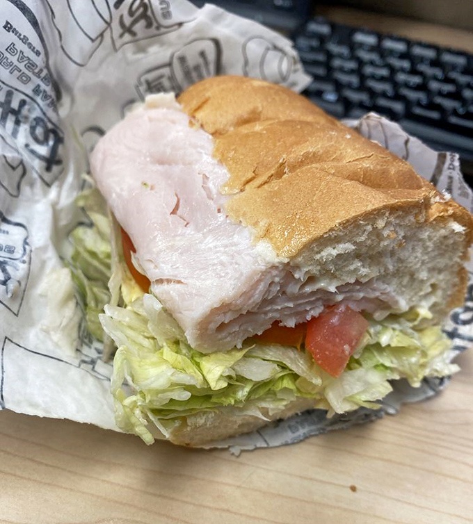 A turkey sandwich that doesn't skimp on the essentials – proof that The Hat's talents extend beyond their pastrami fame.