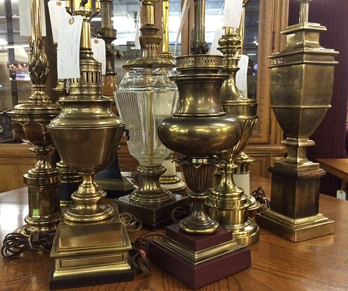 These vintage brass lamps aren't just lighting fixtures—they're time machines to an era when living rooms had gravitas.
