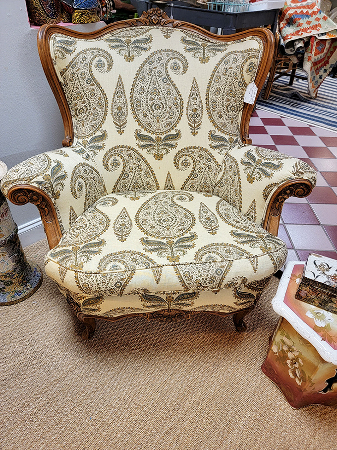 This paisley wingback chair isn't just seating—it's a throne for your living room that says "I have exquisite taste and I'm not afraid to show it."