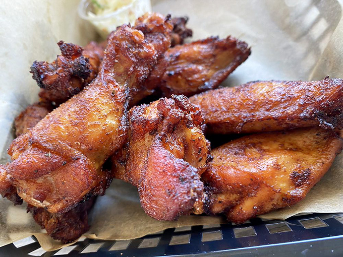 These wings aren't just smoked, they're transformed—achieving that perfect mahogany color that signals flavor in every delectable bite.