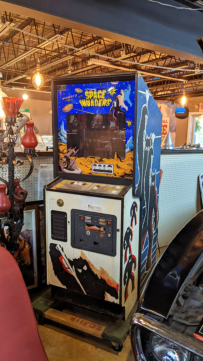 Space Invaders arcade cabinet—the original screen addiction before smartphones. Kids today will never know the satisfaction of that perfect quarter drop.