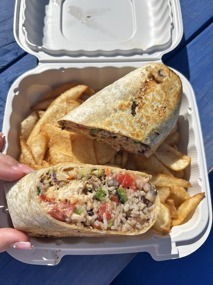 The burrito – nature's perfect food delivery system. Rice, beans, and seafood wrapped in a tidy package that fits perfectly in one hand.