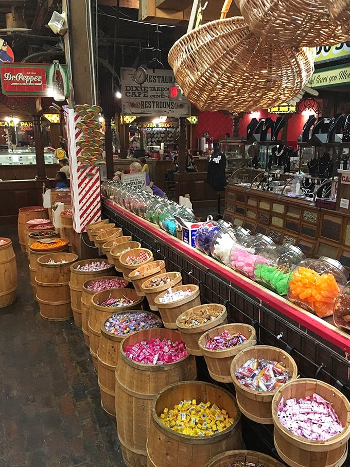 Wooden barrels brimming with candy treasures—proof that sometimes the best souvenirs are the ones that disappear before you get home.