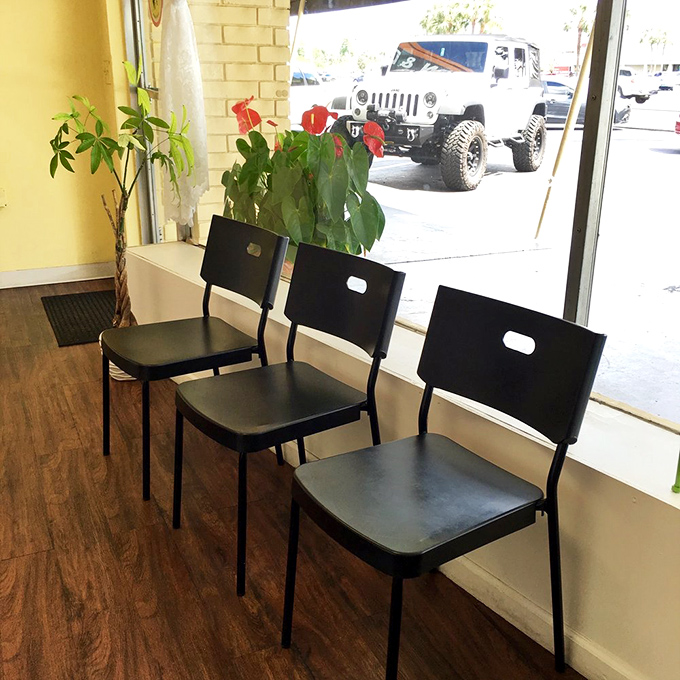 Simple seating that says, "Don't get too comfortable—you'll want to stand up and applaud after your first bite anyway."