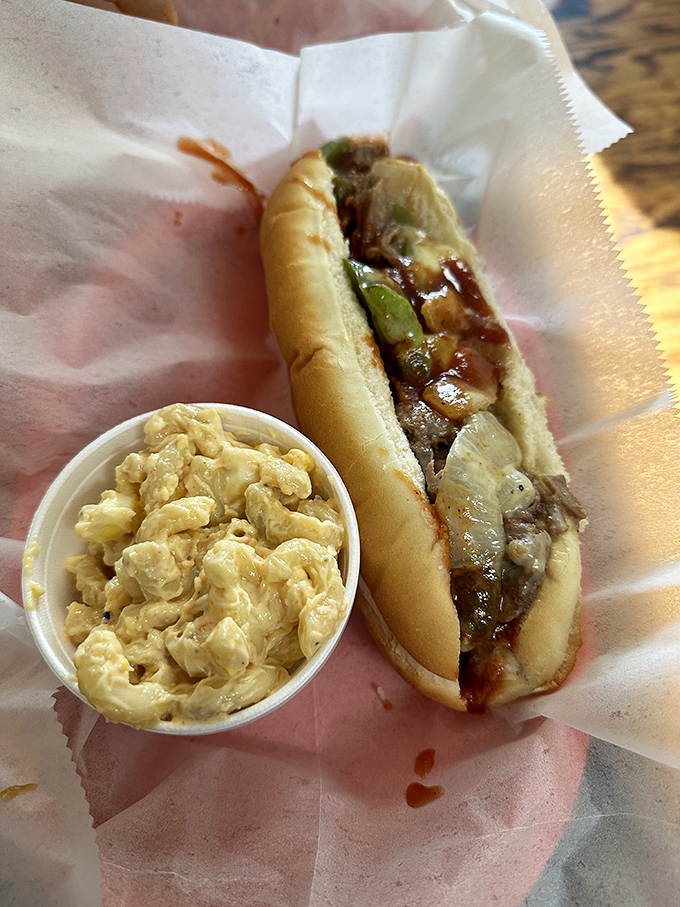 A cheesesteak that doesn't need Philadelphia's permission, paired with mac salad that your grandmother would approve of.