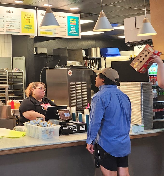 The ordering process here is refreshingly straightforward – no complicated kiosks, just friendly humans taking your burger dreams seriously.