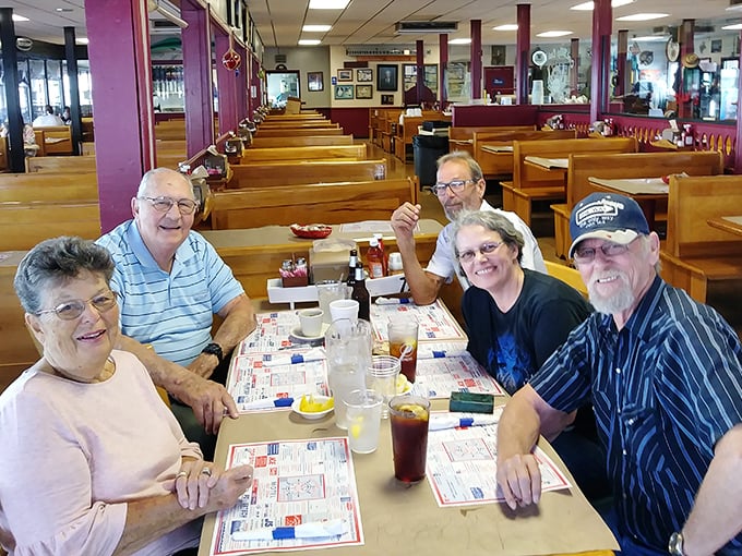 Multi-generational dining is the norm here – where grandparents pass down the sacred art of proper crab picking to eager youngsters.