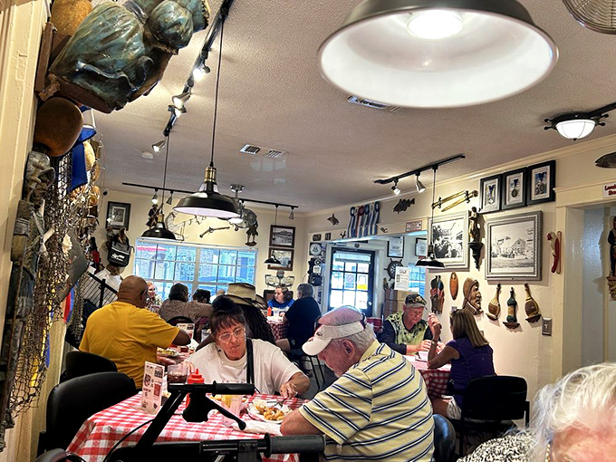 A packed house of happy diners—the universal sign of "you've found the good stuff." Every table holds a story and likely an empty chowder bowl.