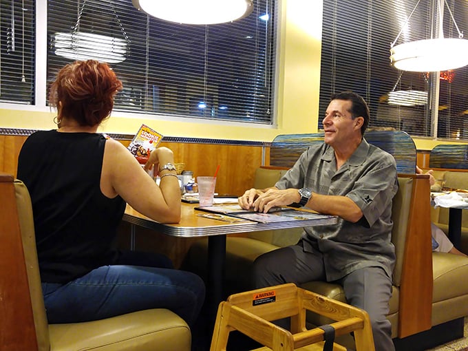 Classic booths where first dates become engagements and casual meals become cherished memories. Notice nobody's looking at their phones?