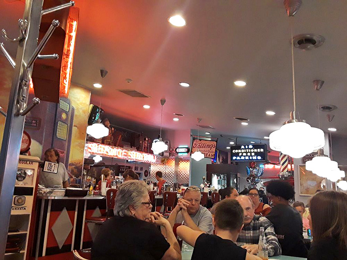 The dining room buzzes with conversation and clinking silverware—the soundtrack of American diner culture at its finest.