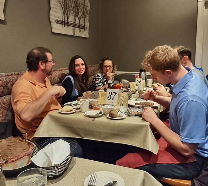 Multi-generational dining at its finest—where family stories flow as freely as the brandy old fashioneds and everyone gets the good chair.
