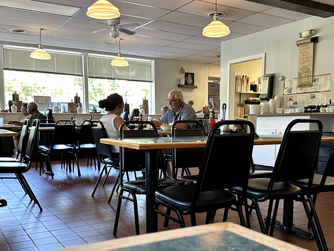 The dining room at Katie's Kitchen—where strangers become neighbors and everyone's united by the universal language of "mmm" and "pass the gravy."