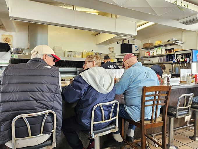The counter crew—Tucson's breakfast society in session. These folks know the secret handshake to start the day right.