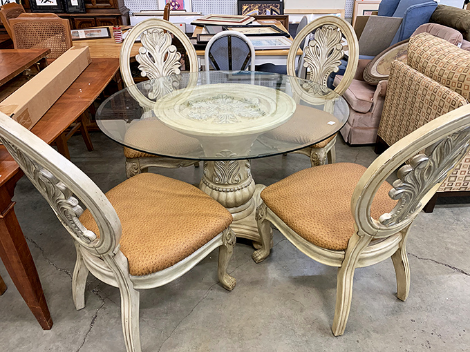 This elegant glass dining set proves secondhand doesn't mean second-best. Those carved chairs are waiting to class up someone's breakfast nook immediately.