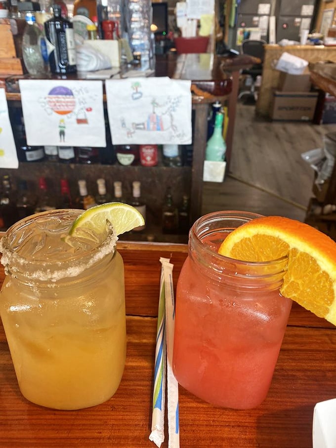 Mason jar cocktails that say "vacation" even if you're just on lunch break. That citrus garnish isn't just pretty—it's doing important work.