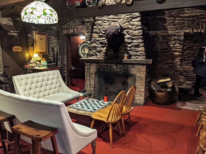 Not just a fireplace—a time machine to when people gathered around hearths instead of screens, complete with checkerboard for actual face-to-face interaction.