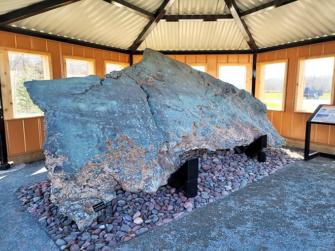 This massive piece of float copper sits like a prehistoric sentinel, telling tales of ancient Michigan when miners discovered these natural treasures.