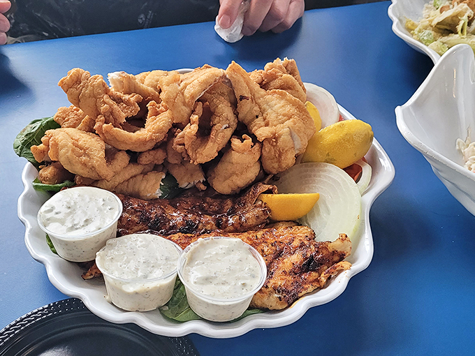 The seafood platter that makes you wonder why you ever eat anything else. Three dipping sauces because life's too short for condiment monogamy.