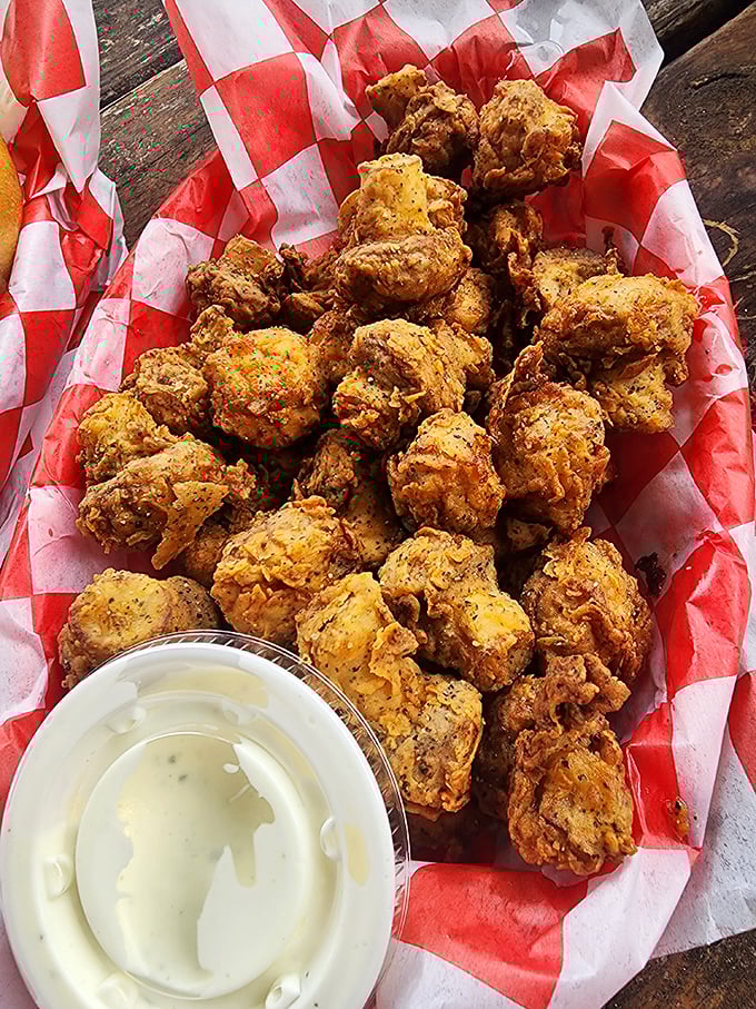 These golden-fried mushrooms aren't just appetizers—they're little umami bombs of joy. The dipping sauce is non-negotiable.