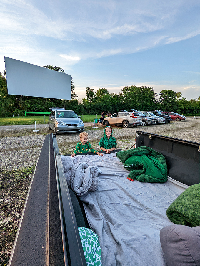 Truck beds transform into cozy nests of blankets and pillows, where movie magic meets childhood wonder