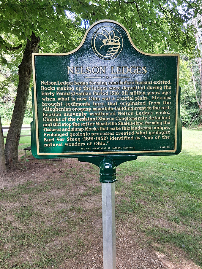 History lesson in green and gold. This marker reveals the mind-boggling timeline of these formations—making your mortgage seem delightfully temporary by comparison.