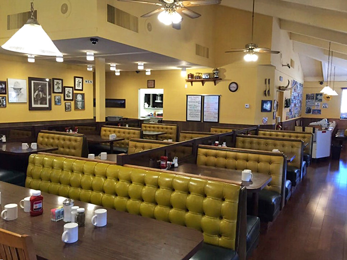 Booth seating that invites lingering conversations over coffee refills and shared breakfast stories together.