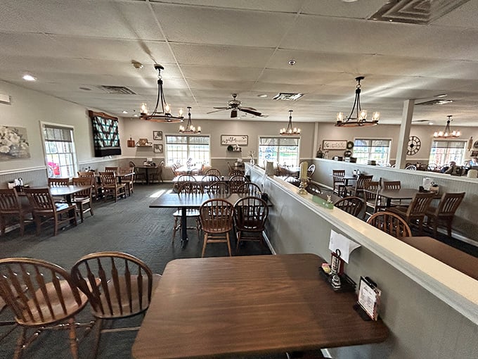 The dining room stretches before you like a promise—each table an opportunity for the kind of meal that creates memories and loosens belts.