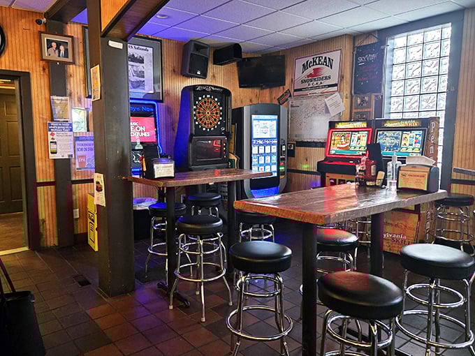 The game area—where friendships are tested, darts occasionally go astray, and "just one more game" becomes the night's biggest lie.