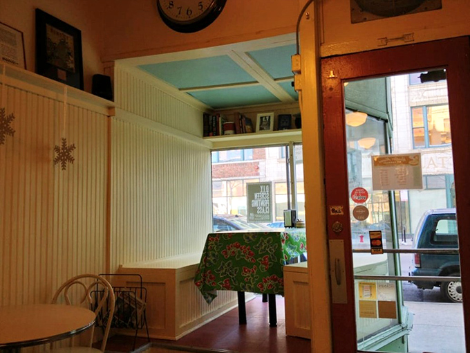 Cozy seating where strangers become friends over shared appreciation for butter, sugar, and pure culinary magic happening.