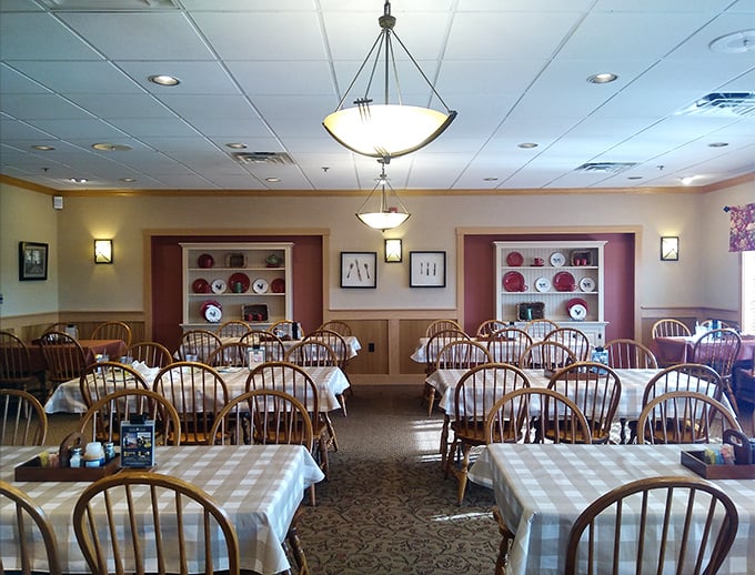 Another dining room view showcasing the thoughtful touches—built-in display shelves holding decorative plates that remind you this isn't your average roadside eatery.